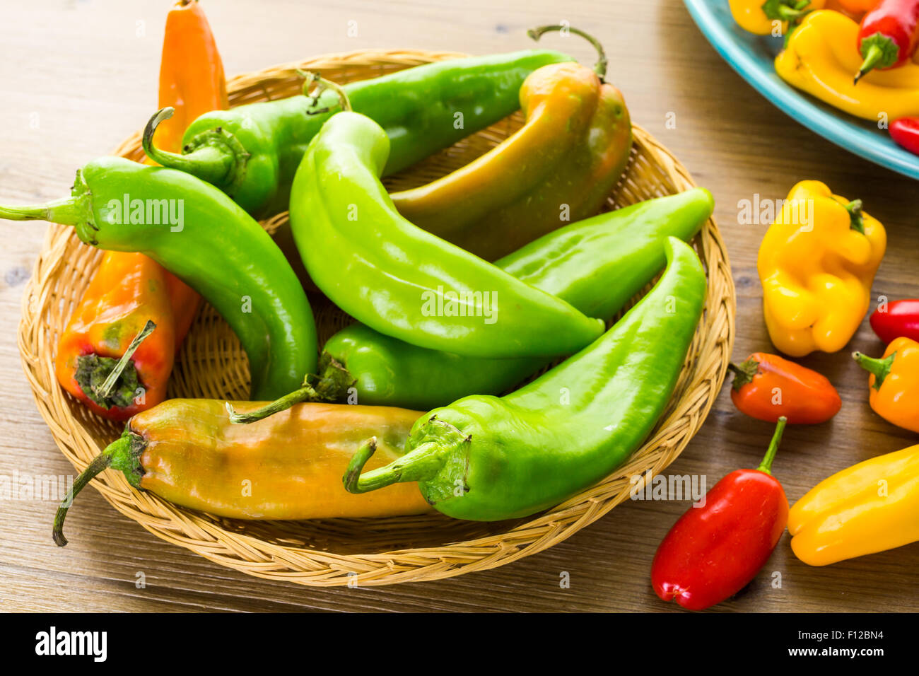 Variety of fresh organic peppers on the table Stock Photo - Alamy