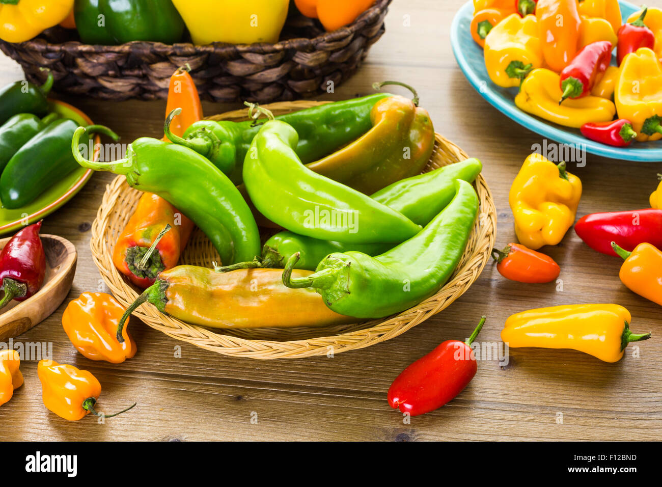 Variety of fresh organic peppers on the table Stock Photo - Alamy