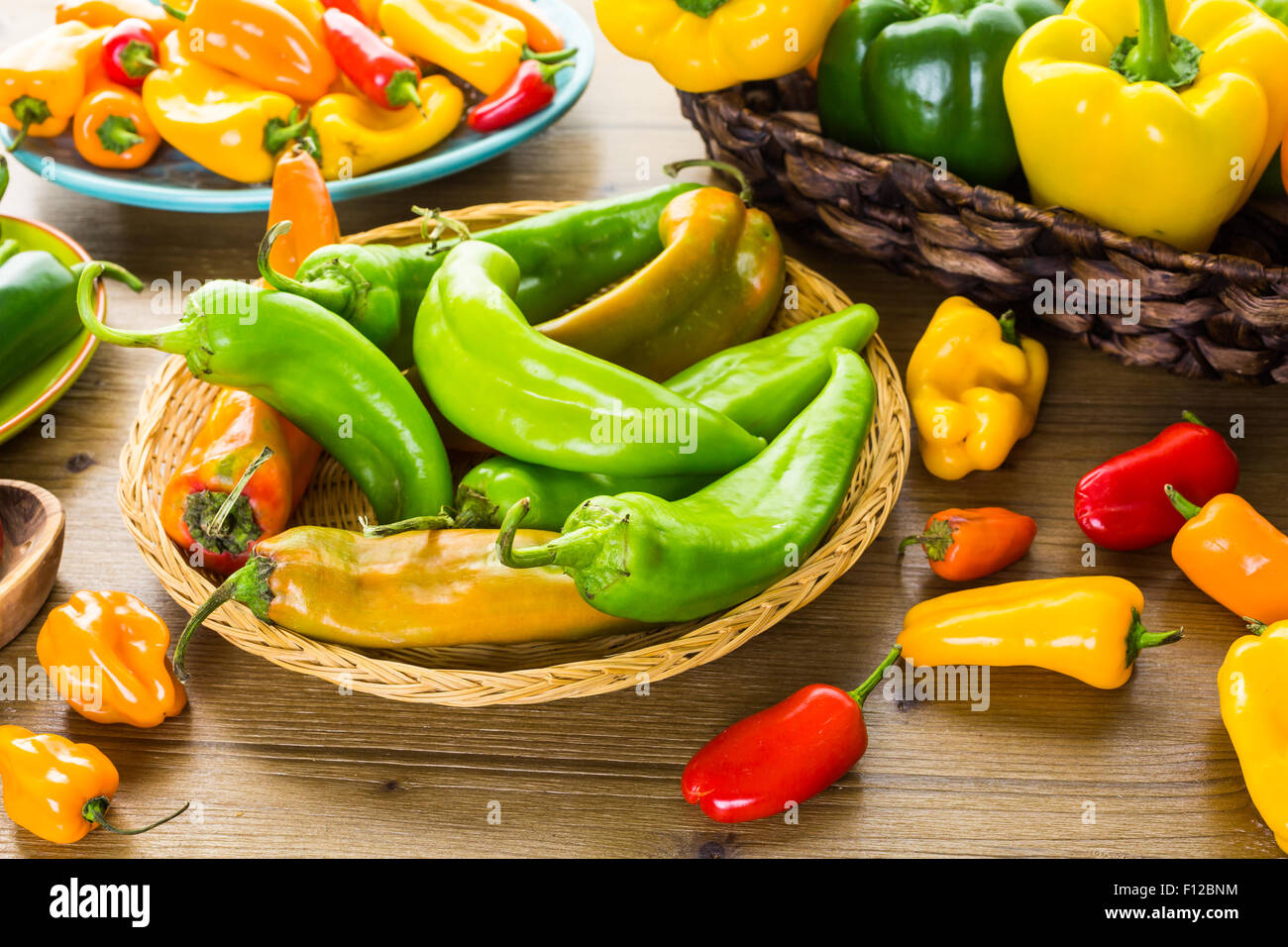 Variety of fresh organic peppers on the table Stock Photo - Alamy