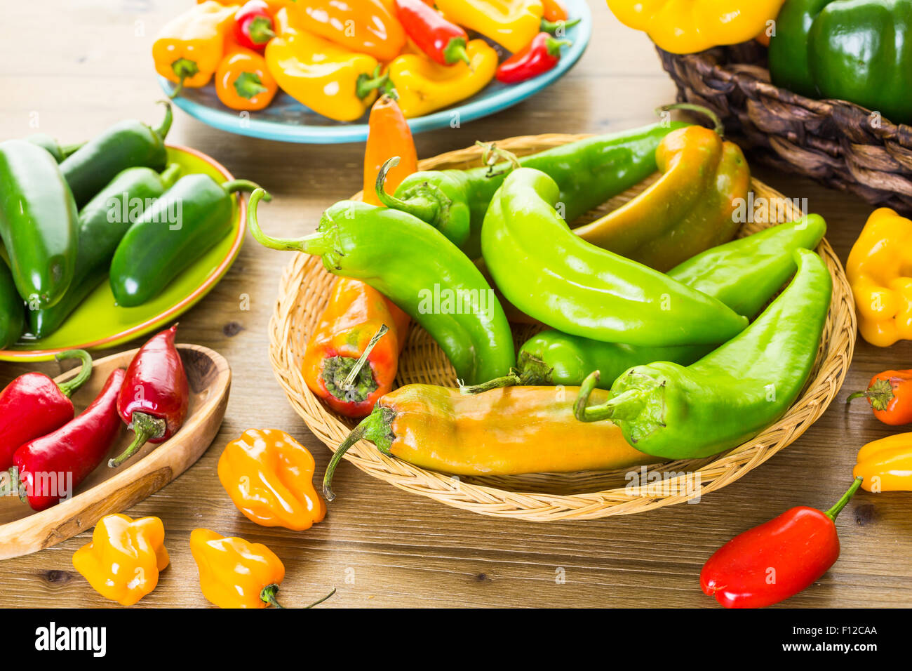 Variety of fresh organic peppers on the table Stock Photo - Alamy