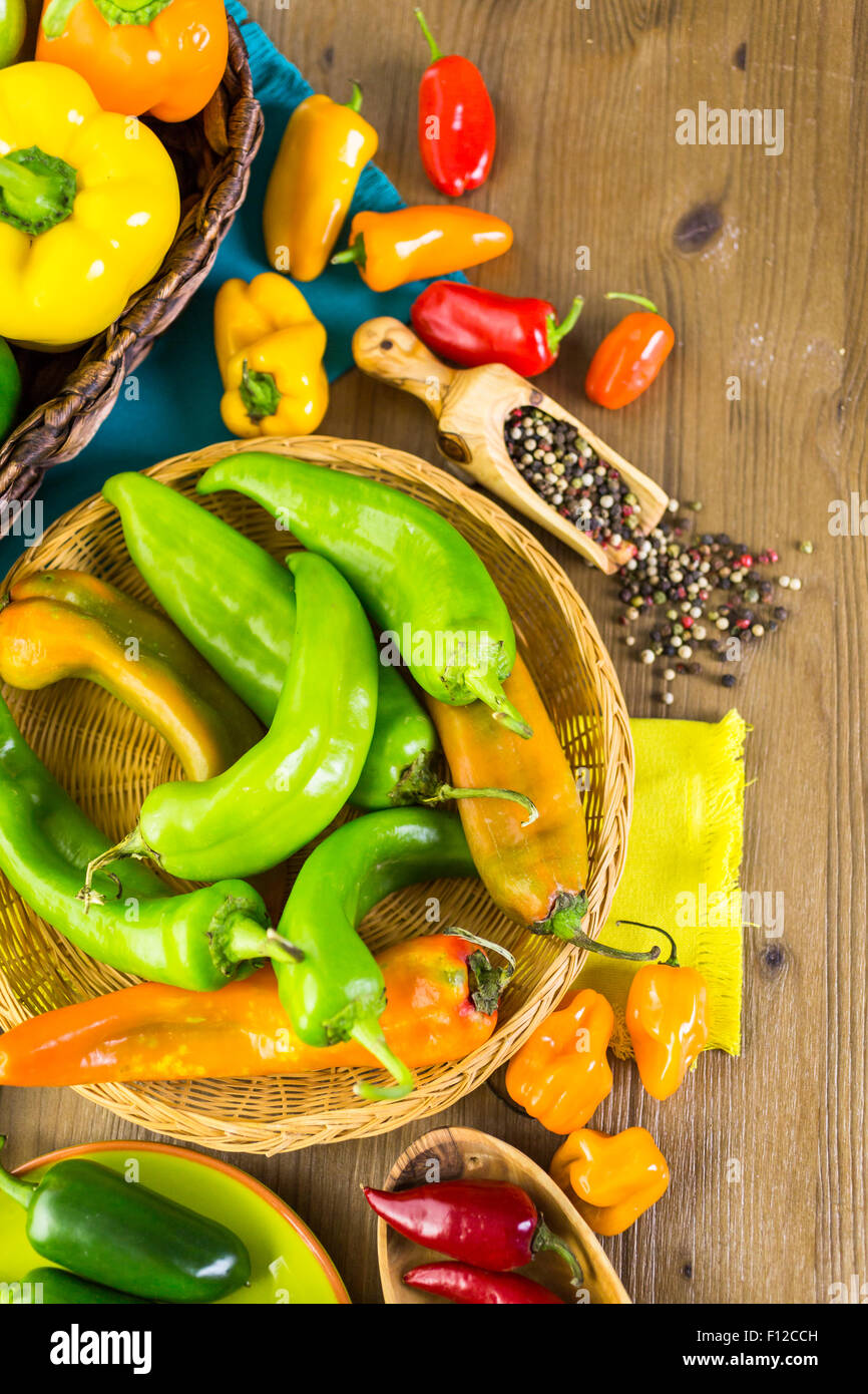 Variety of fresh organic peppers on the table Stock Photo - Alamy