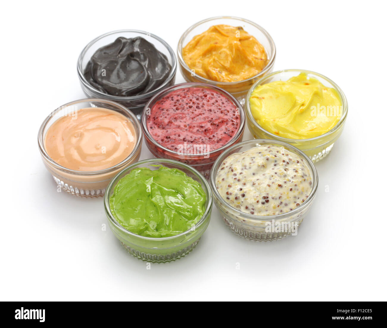 homemade assorted mayonnaise sauce on white background black sesame ...