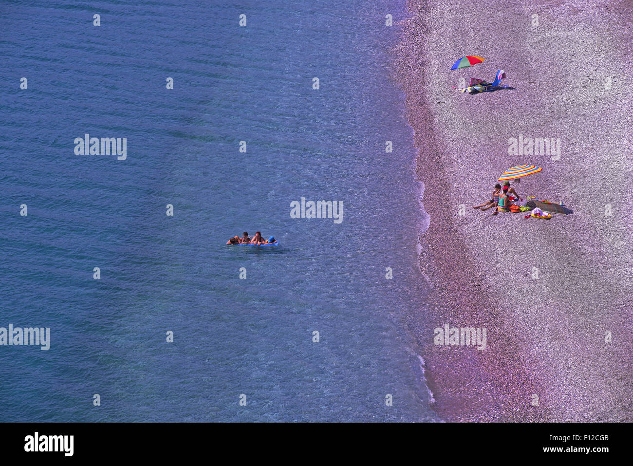 Swimming and sunbathing at Plaka beach located near Leonidio town, in ...