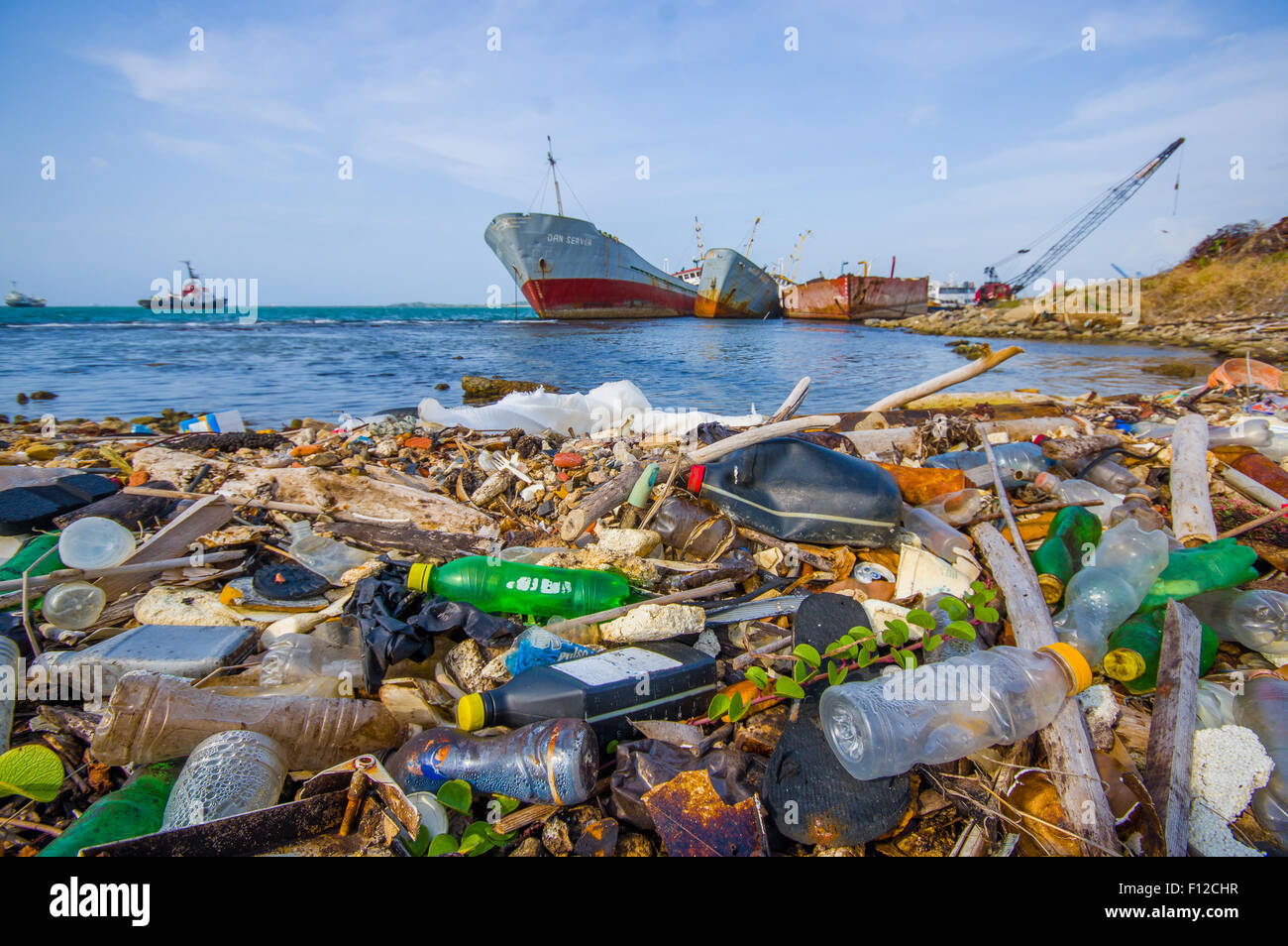 COLON, PANAMA - APRIL 15, 2015: Waste and pollution washing on the ...