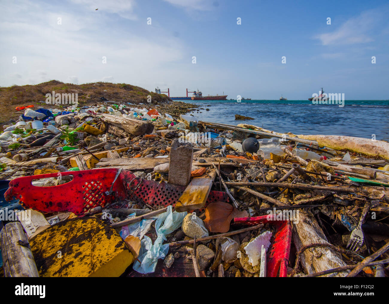 COLON, PANAMA - APRIL 15, 2015: Waste and pollution washing on the ...