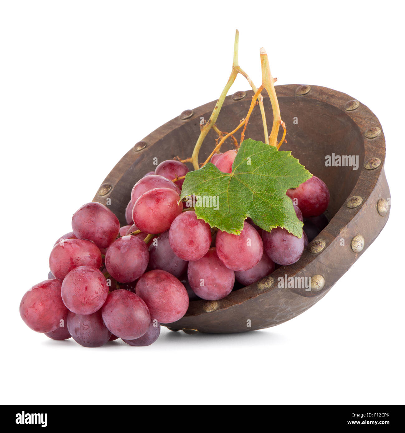 Fresh red grapes in wood bown isolated on white background Stock Photo ...