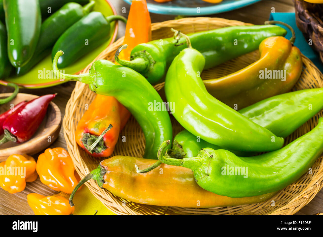 Variety of fresh organic peppers on the table Stock Photo - Alamy
