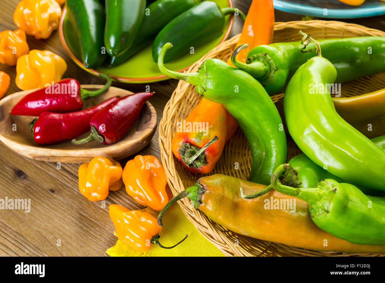 Variety of fresh organic peppers on the table Stock Photo - Alamy
