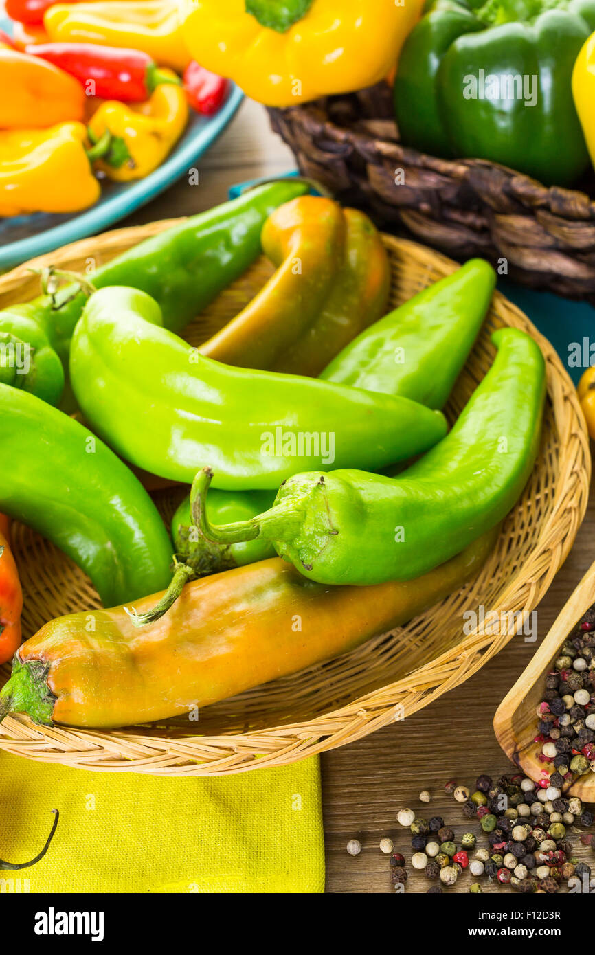 Variety of fresh organic peppers on the table Stock Photo - Alamy