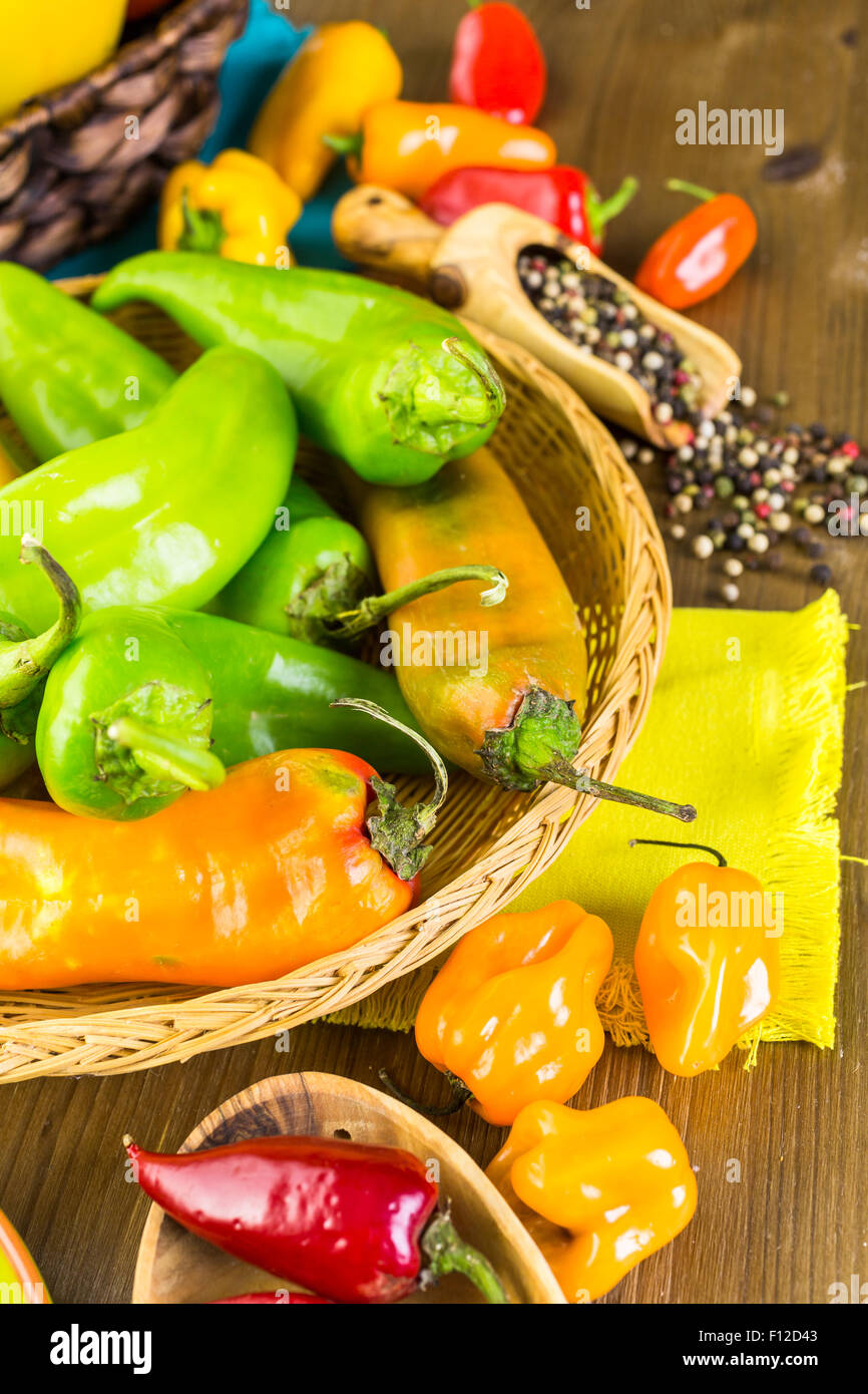 Variety of fresh organic peppers on the table Stock Photo - Alamy
