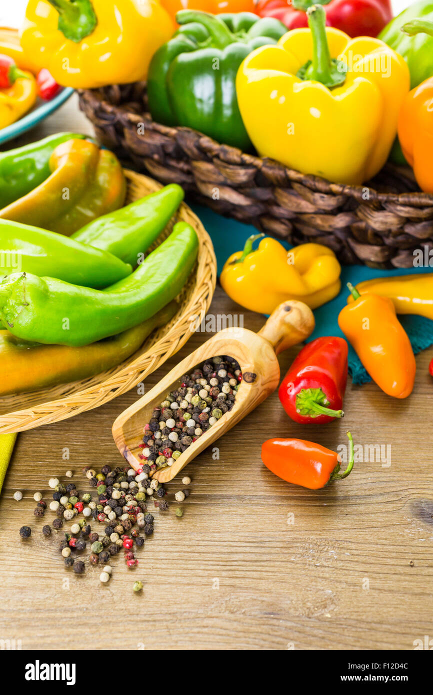 Variety of fresh organic peppers on the table Stock Photo - Alamy