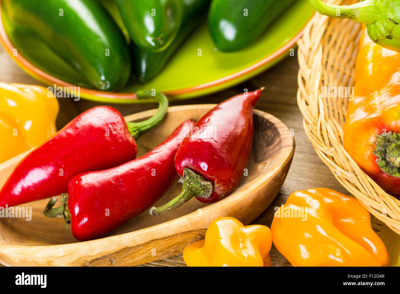 Variety of fresh organic peppers on the table Stock Photo - Alamy
