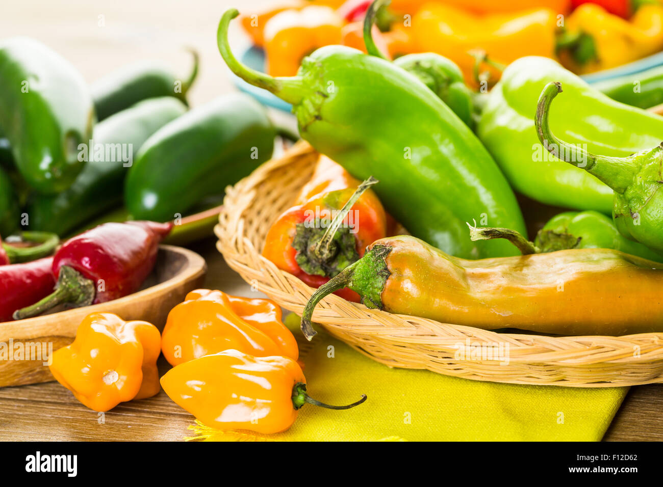 Variety of fresh organic peppers on the table Stock Photo - Alamy