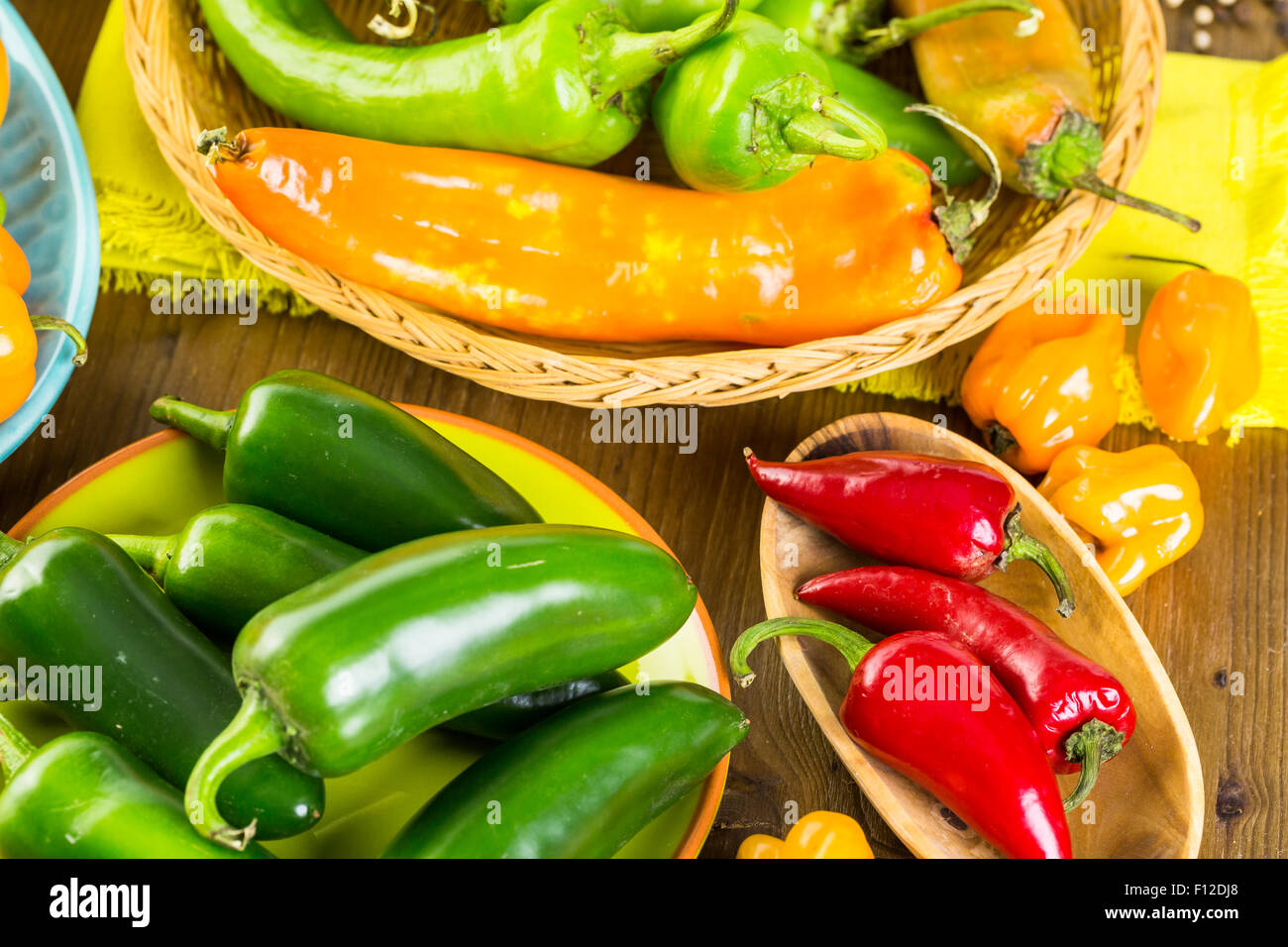 Variety of fresh organic peppers on the table Stock Photo - Alamy