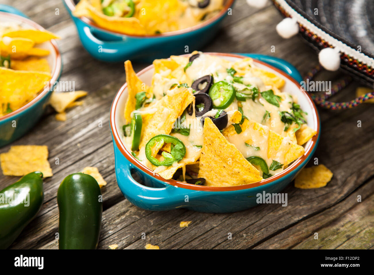 Nachos with melted cheese Stock Photo - Alamy