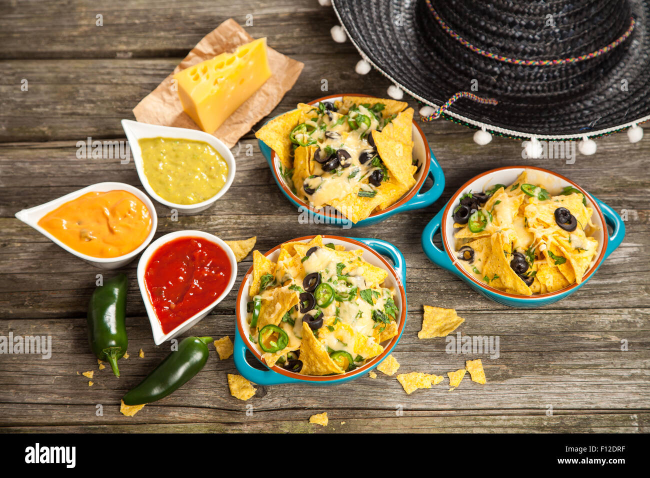 Nachos with melted cheese Stock Photo - Alamy