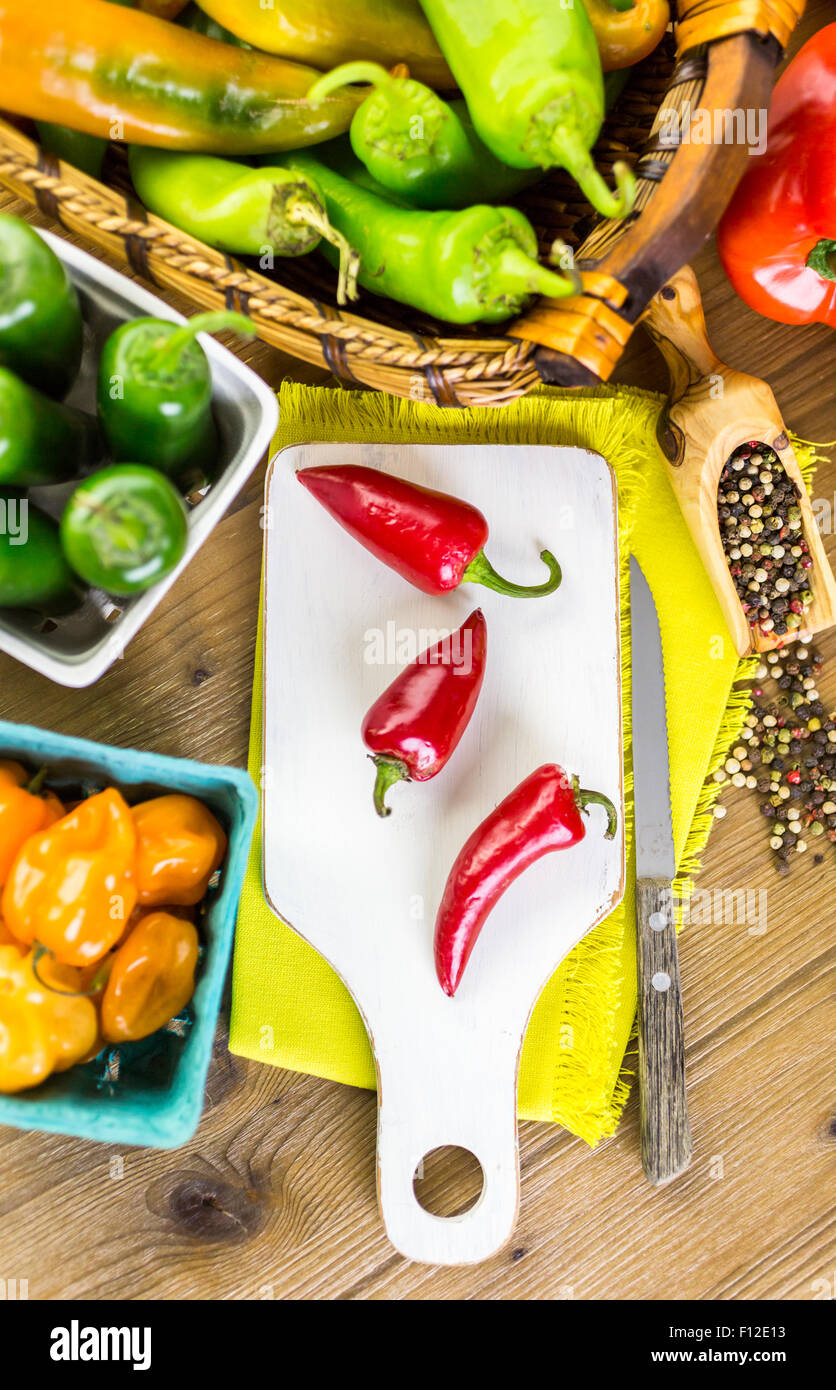 Variety of fresh organic peppers on the table Stock Photo - Alamy
