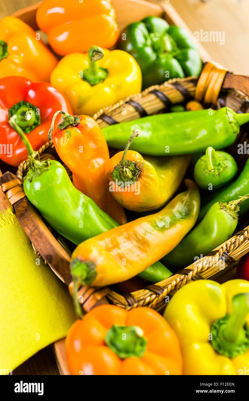 Variety of fresh organic peppers on the table Stock Photo - Alamy