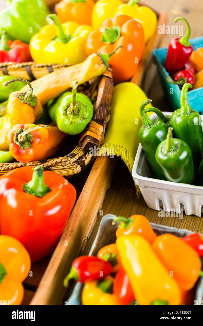 Variety of fresh organic peppers on the table Stock Photo - Alamy