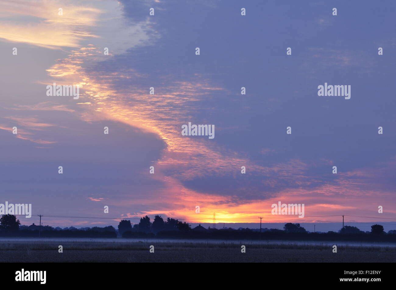 Late summer sunrise over Holbeach Marsh, Lincolnshire Fens, UK Stock ...