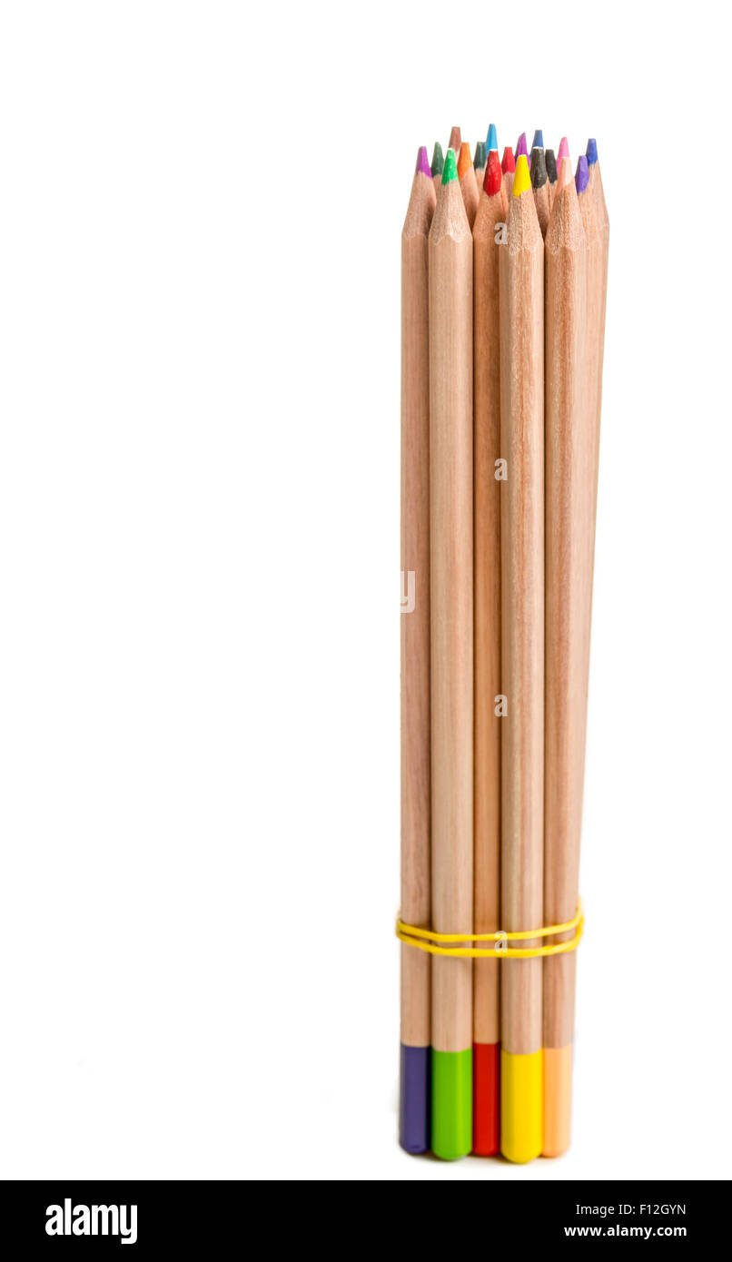 Bundle of colored pencils in a vertical position against a white ...