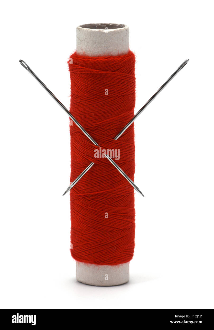 Needle and thread isolated over white background Stock Photo - Alamy