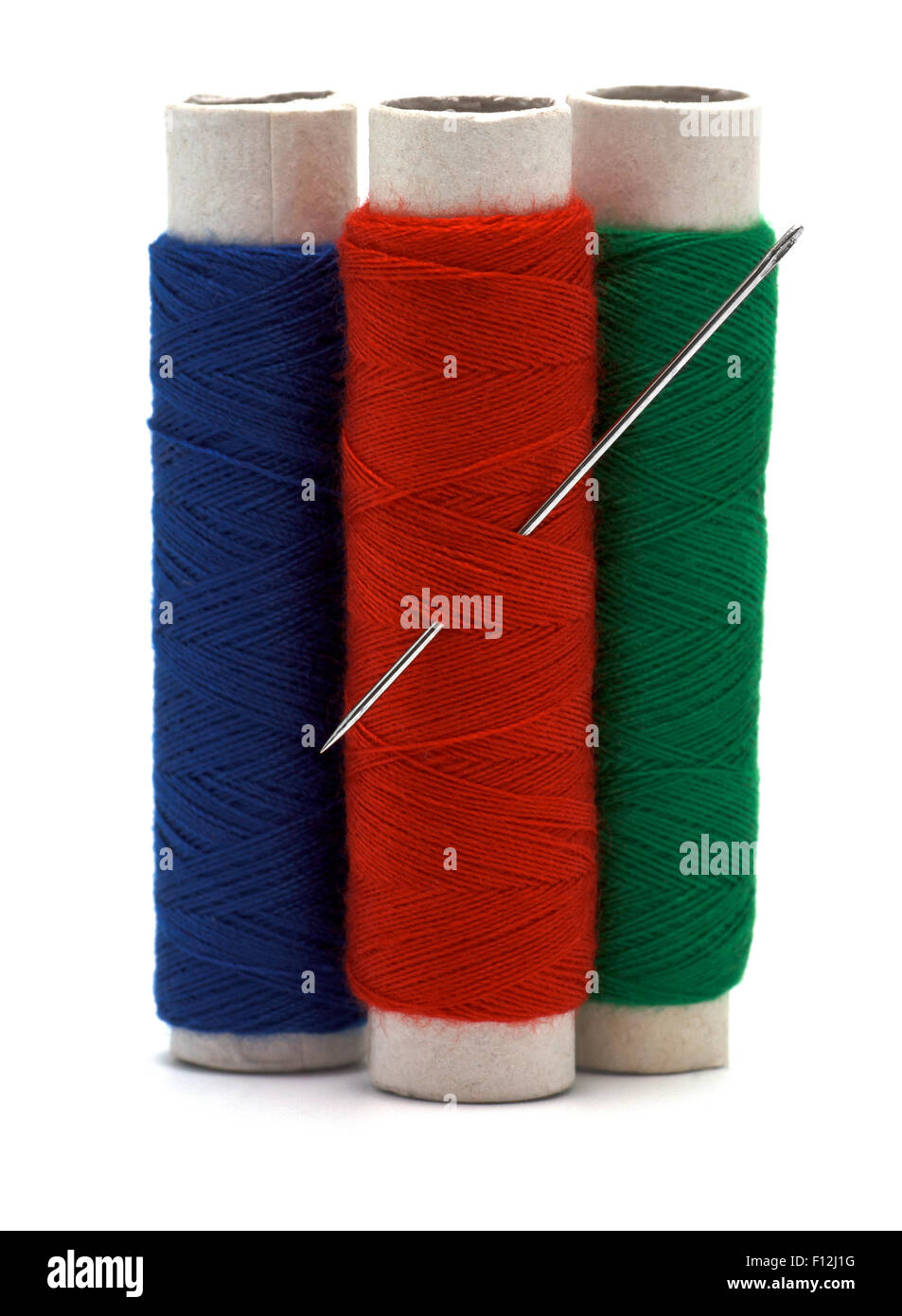 Needle and thread isolated over white background Stock Photo - Alamy