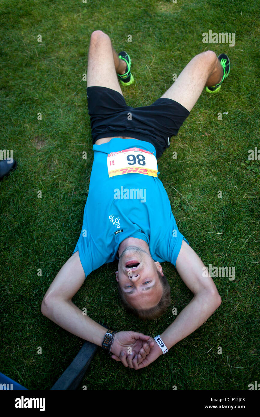 Exhausted female runner in race hi-res stock photography and images - Alamy