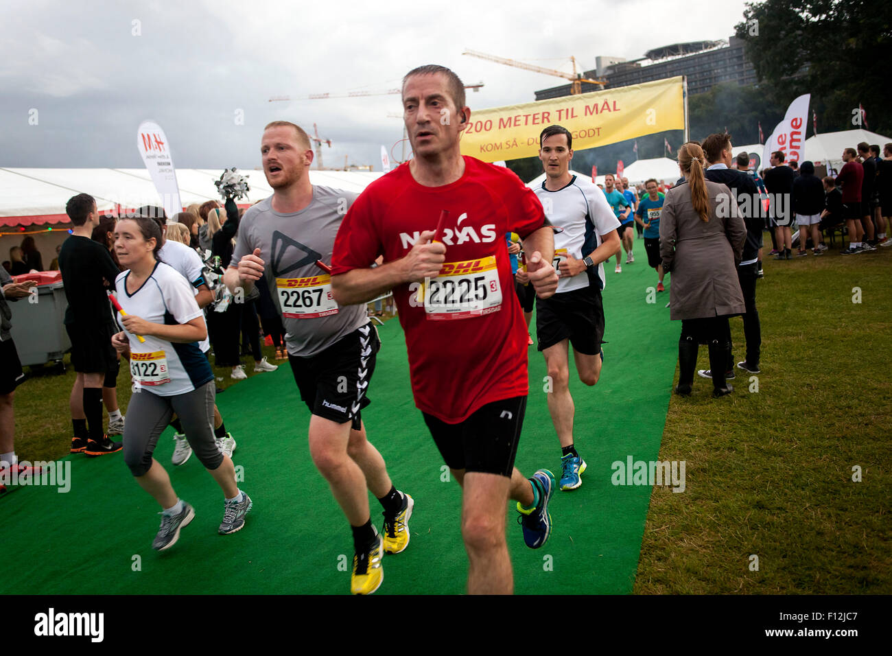 Copenhagen, Denmark, August 25th, 2015. Relay runners on the way for ...
