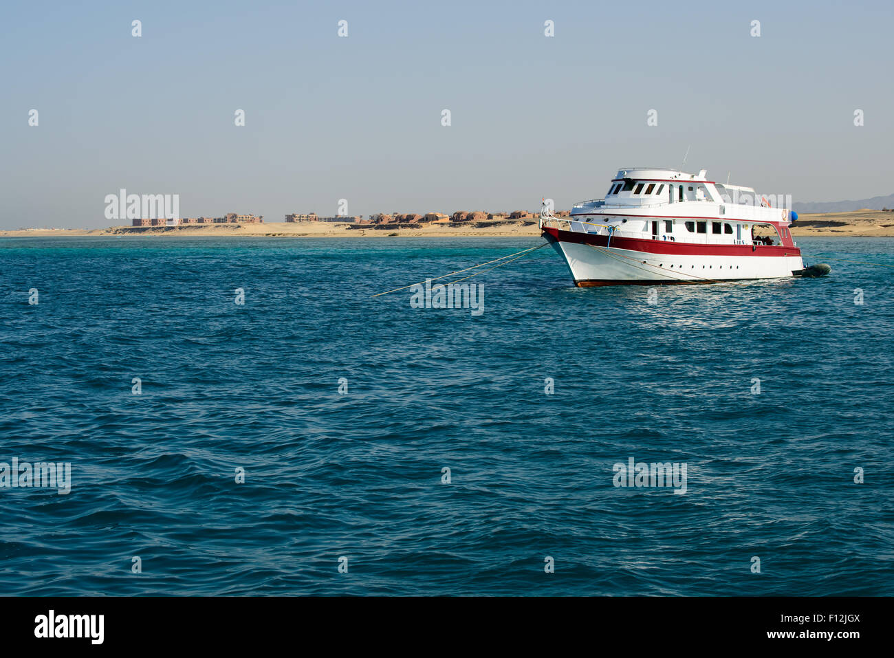 In the picture a yacht anchored near the port of Hamata , Egypt Red Sea ...