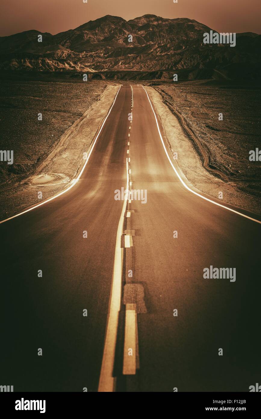 Desert Road To Nowhere. Vertical Dark Sepia Color Grading Road Photo ...