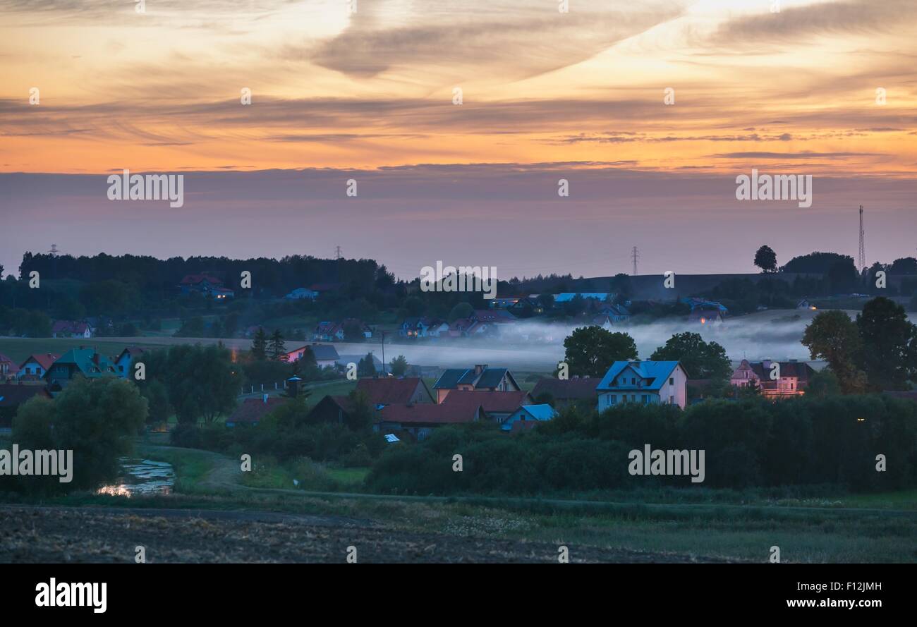 Beautiful and spectacular sunset sky over calm countryside. Polish ...