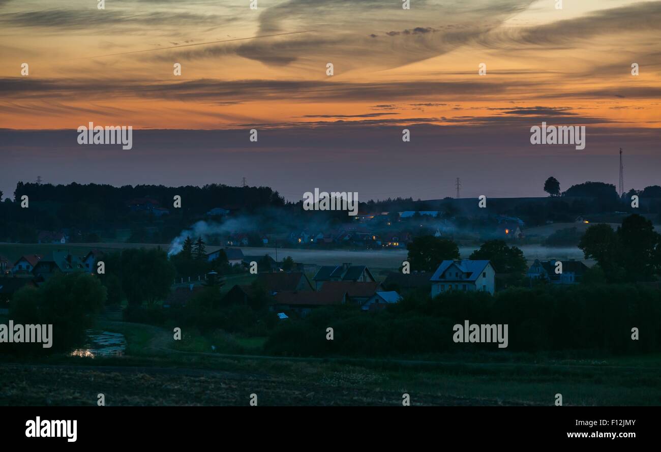 Beautiful and spectacular sunset sky over calm countryside. Polish ...