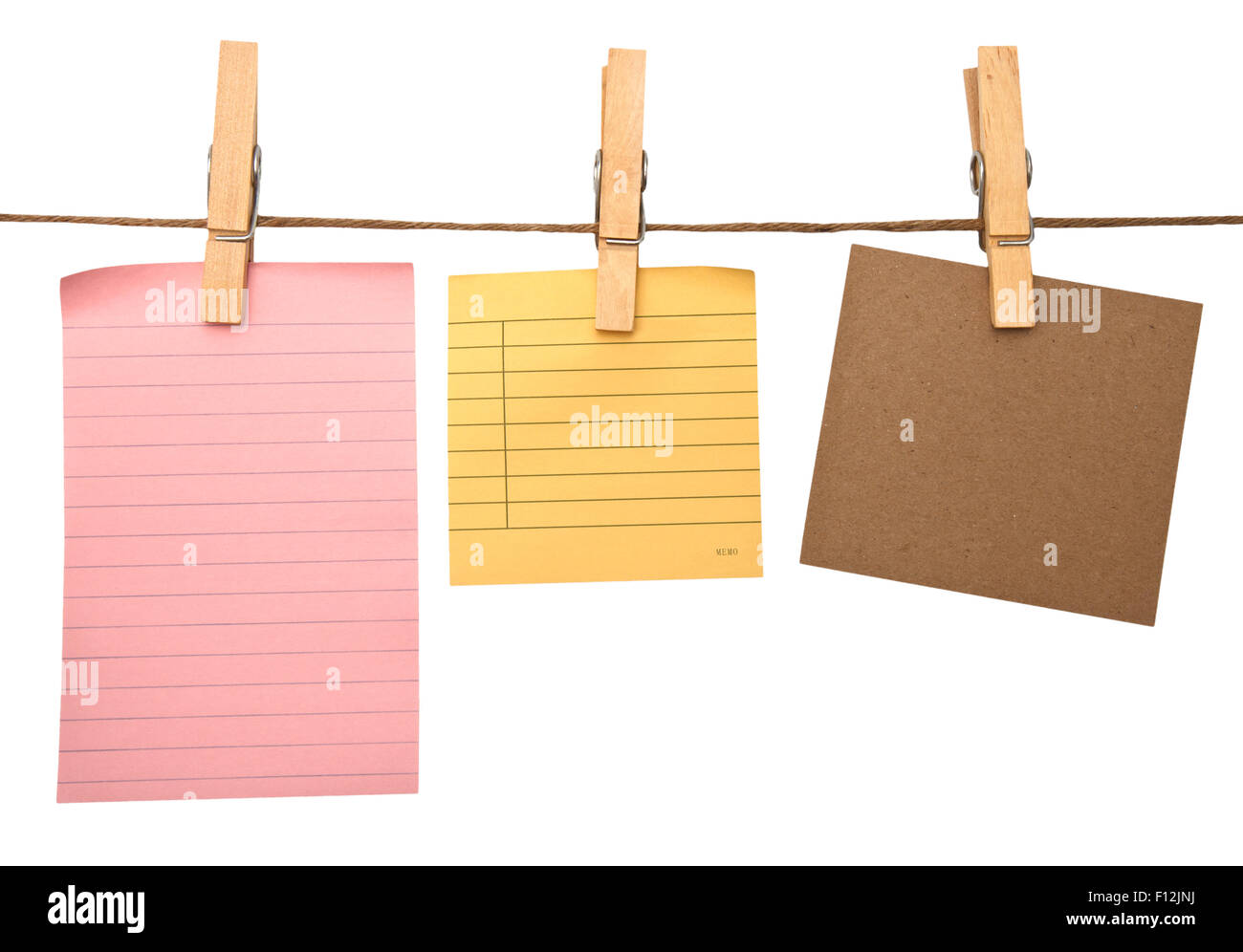 close up of a notes and a clothes pegs on white background Stock Photo ...