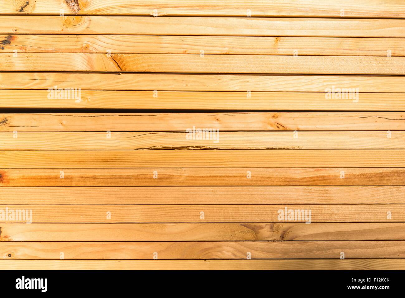 Timber Background. Raw Planks Pile Side View Backdrop Stock Photo - Alamy