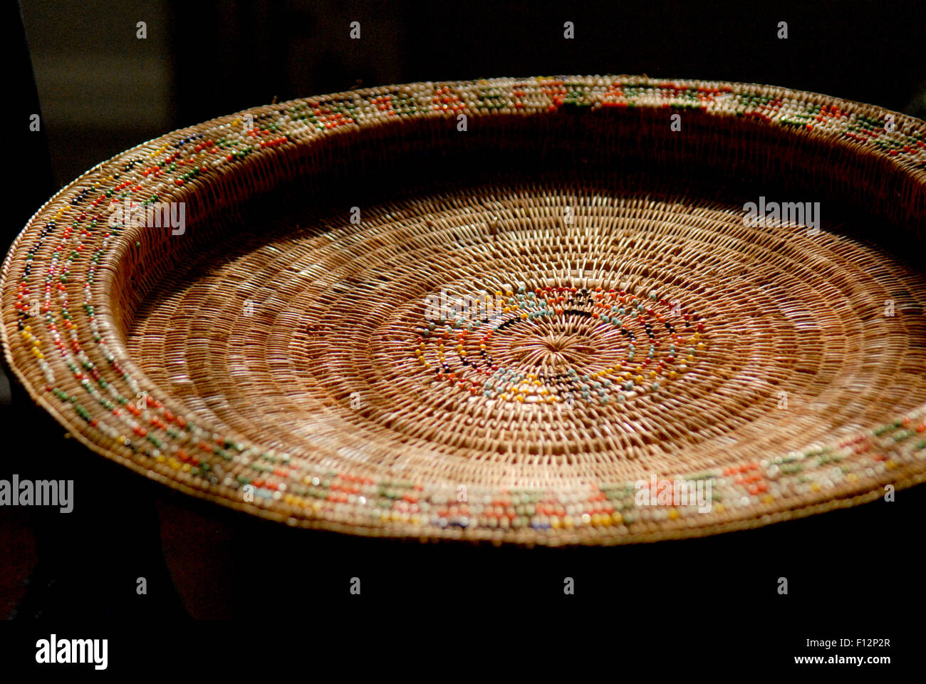 Woven straw and grass beaded basket platter tray from Africa Stock ...