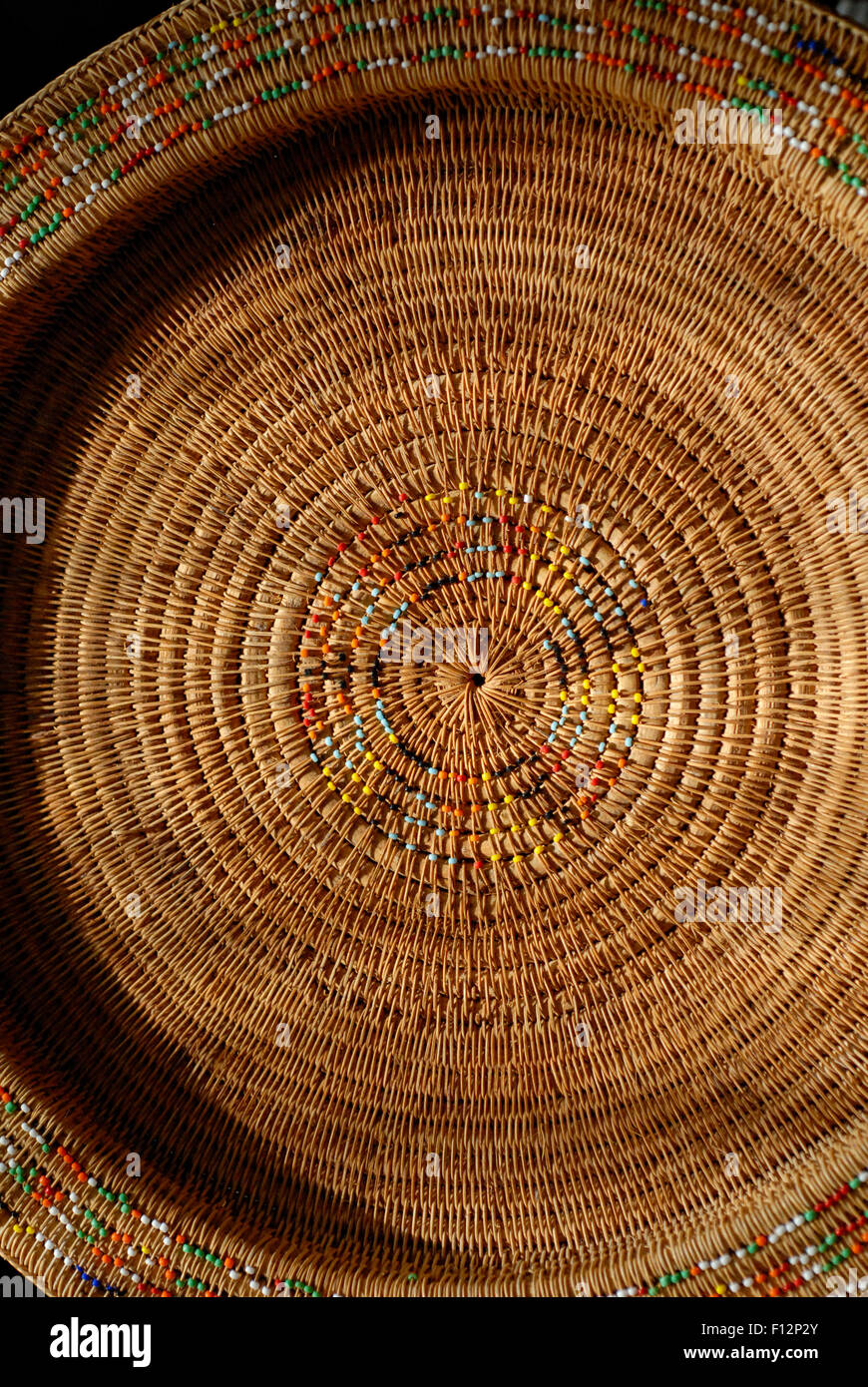 Woven straw and grass beaded basket platter tray from Africa Stock ...