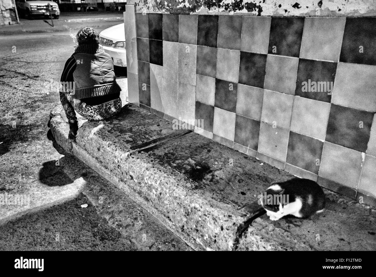 Juarez, Chihuahua, Mexico. 2nd Nov, 2014. A prostitute sits outside one ...