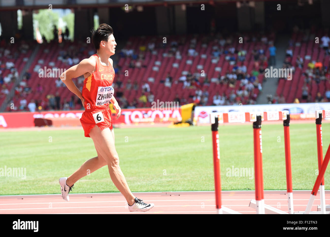 Beijing, China. 26th Aug, 2015. Zhang Honglin of China reacts during ...