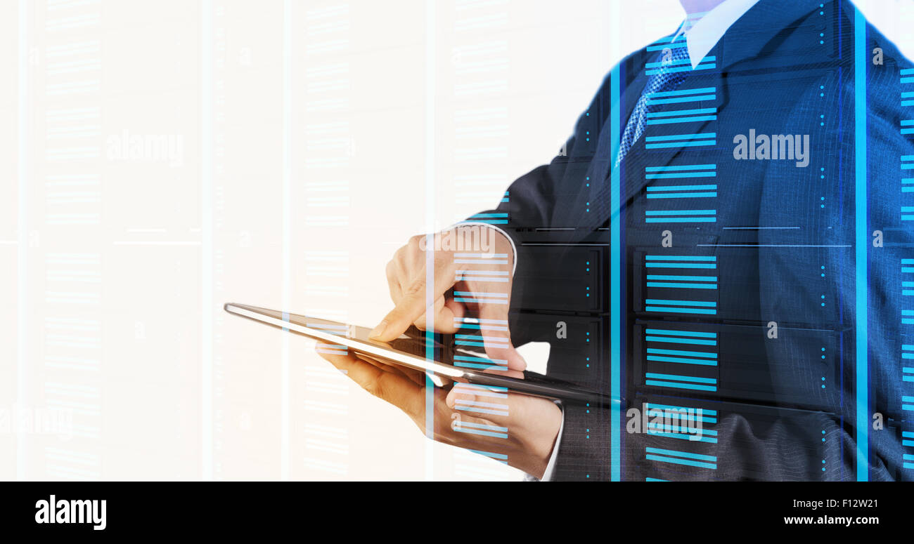 Double exposure of businessman hand pressing a touchscreen button on ...