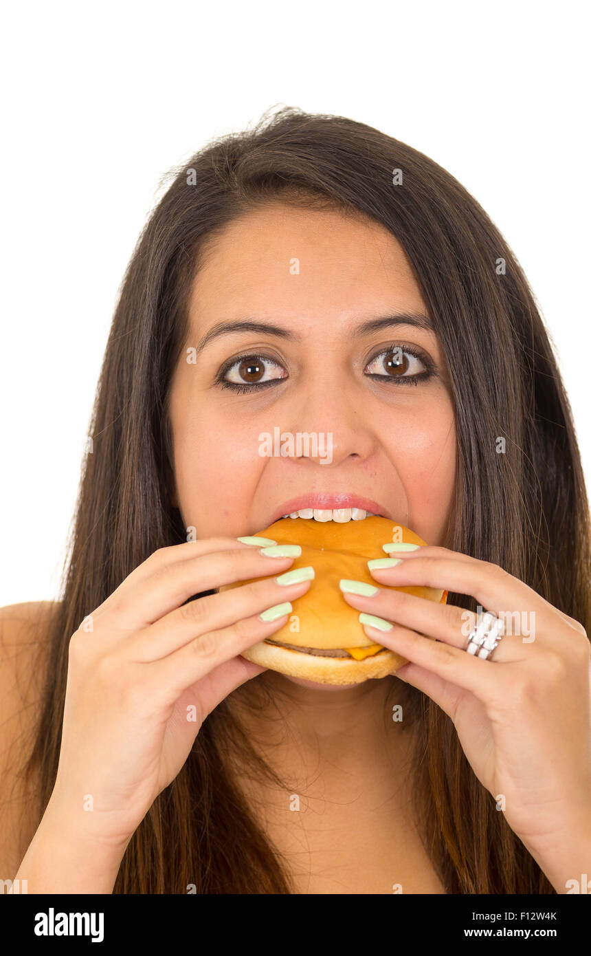 Headshot hispanic brunette model wearing black top eating hamburger ...
