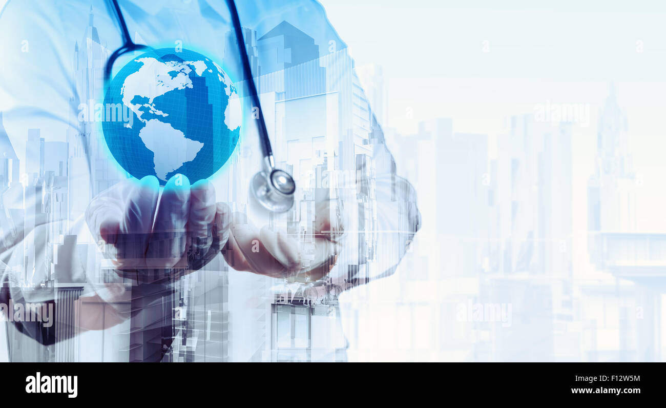 Double exposure of smart medical doctor holding the world with abstract ...
