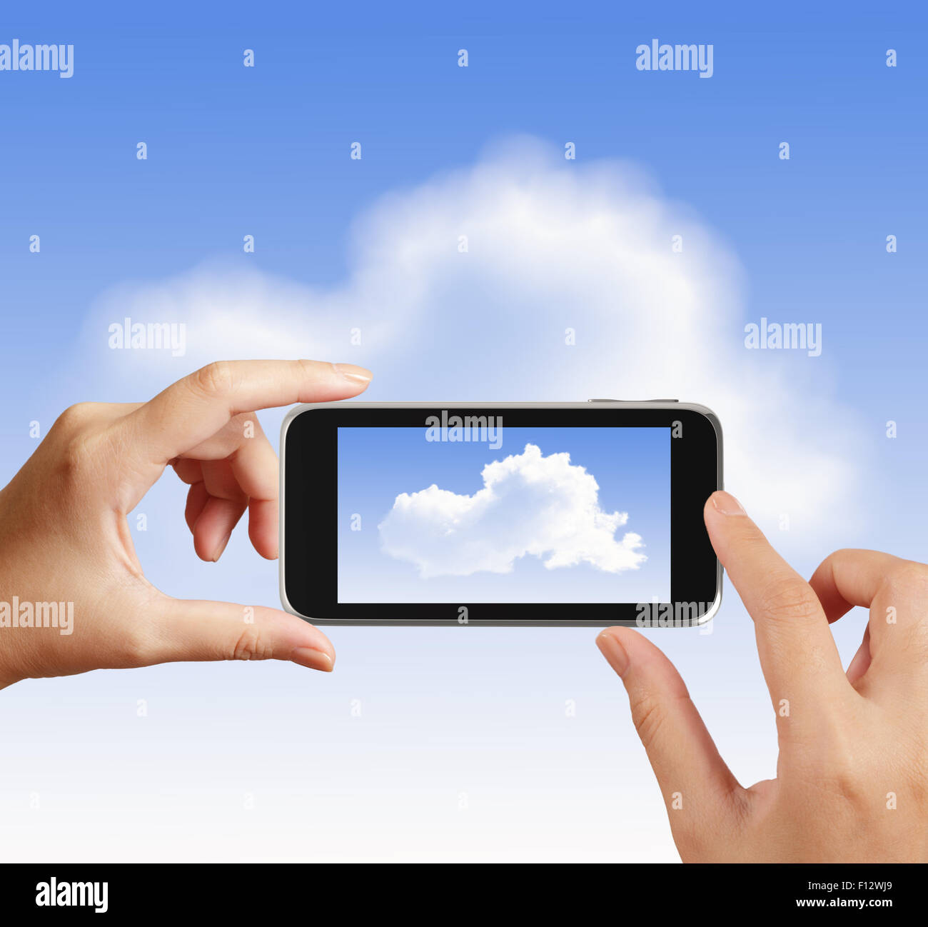Smart hand using touch screen phone take photo of cloud icon as concept ...