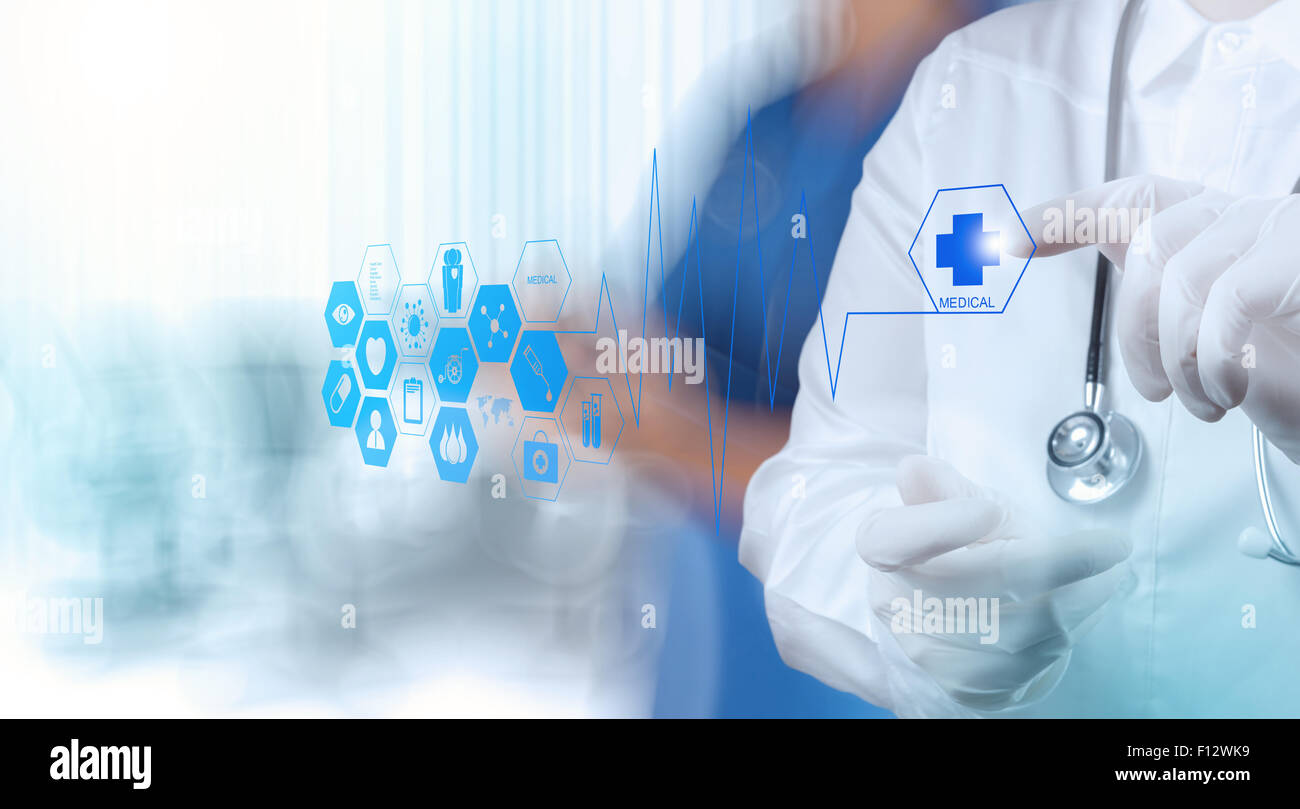Medicine doctor hand working with modern computer interface as medical ...
