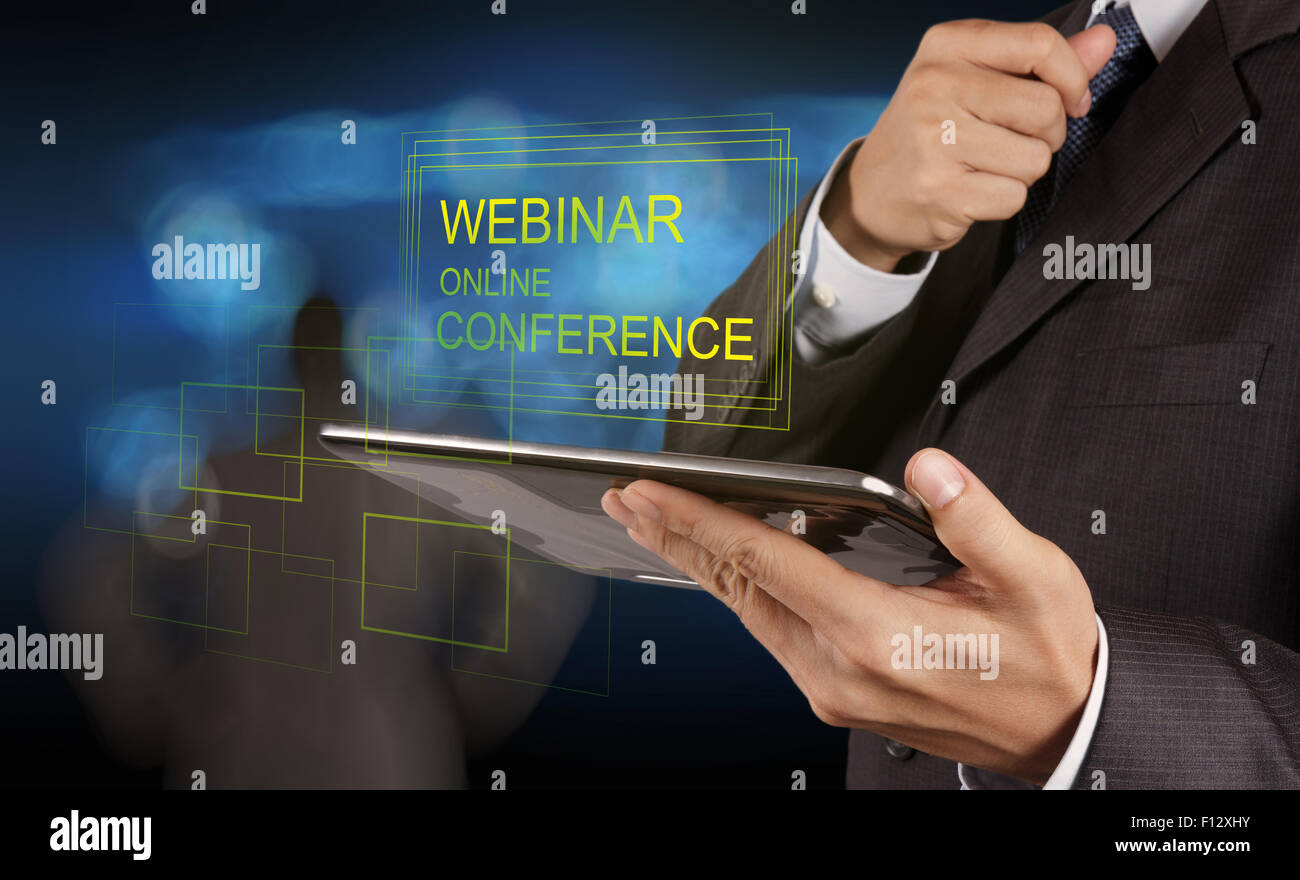 businessman hand show webinar online conference as concept Stock Photo ...