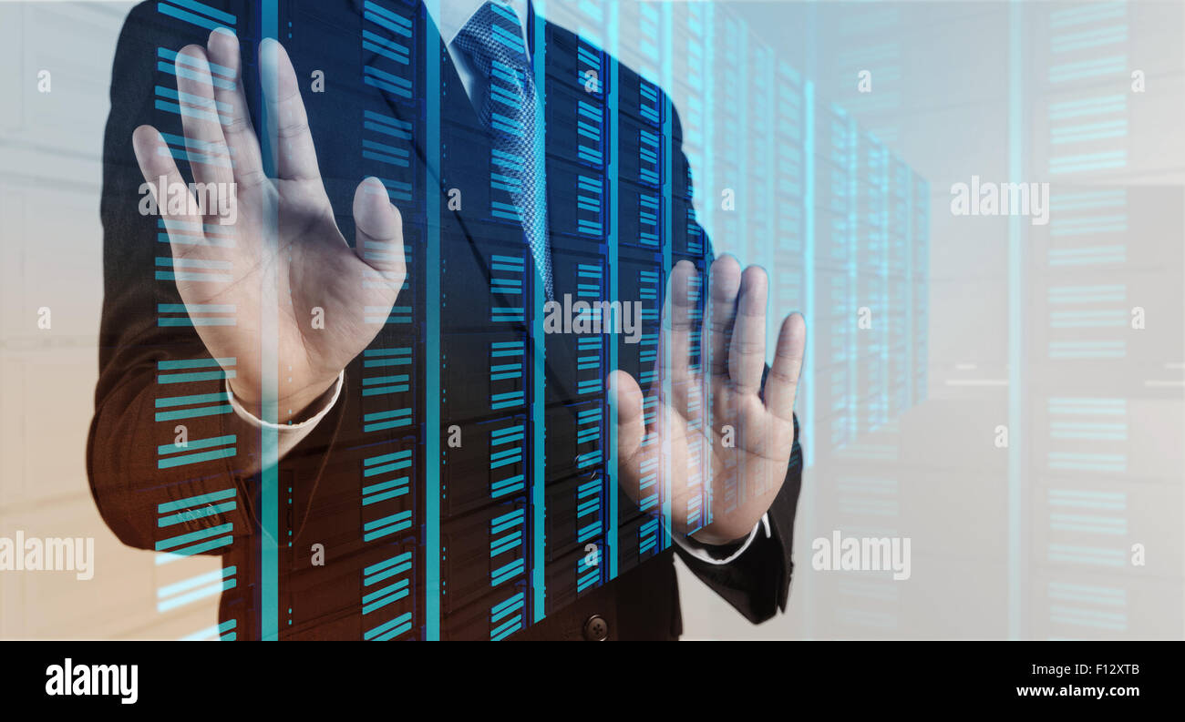 Double exposure of businessman hand pressing a touchscreen button on ...