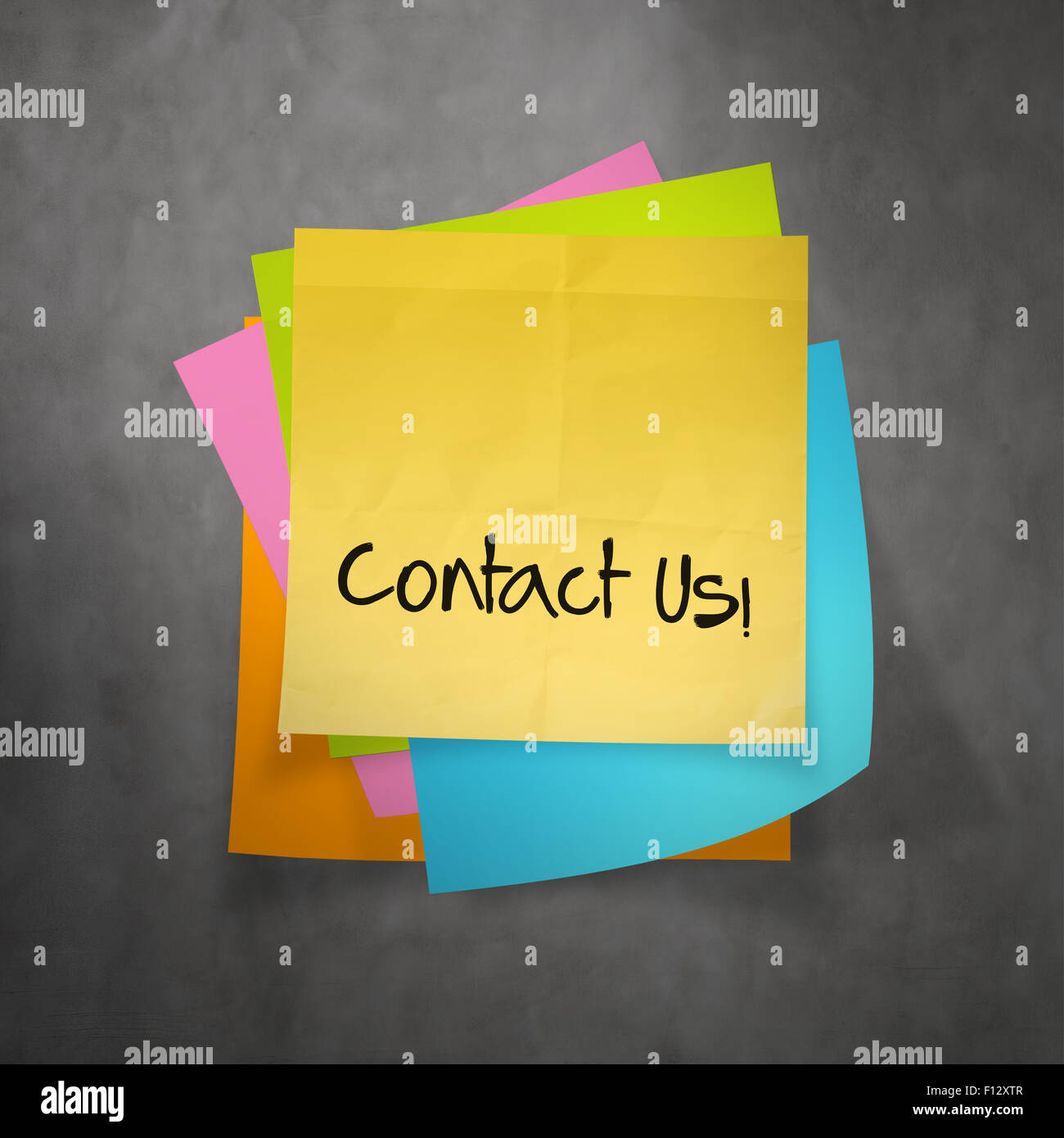 contact us text on sticky note paper Stock Photo - Alamy