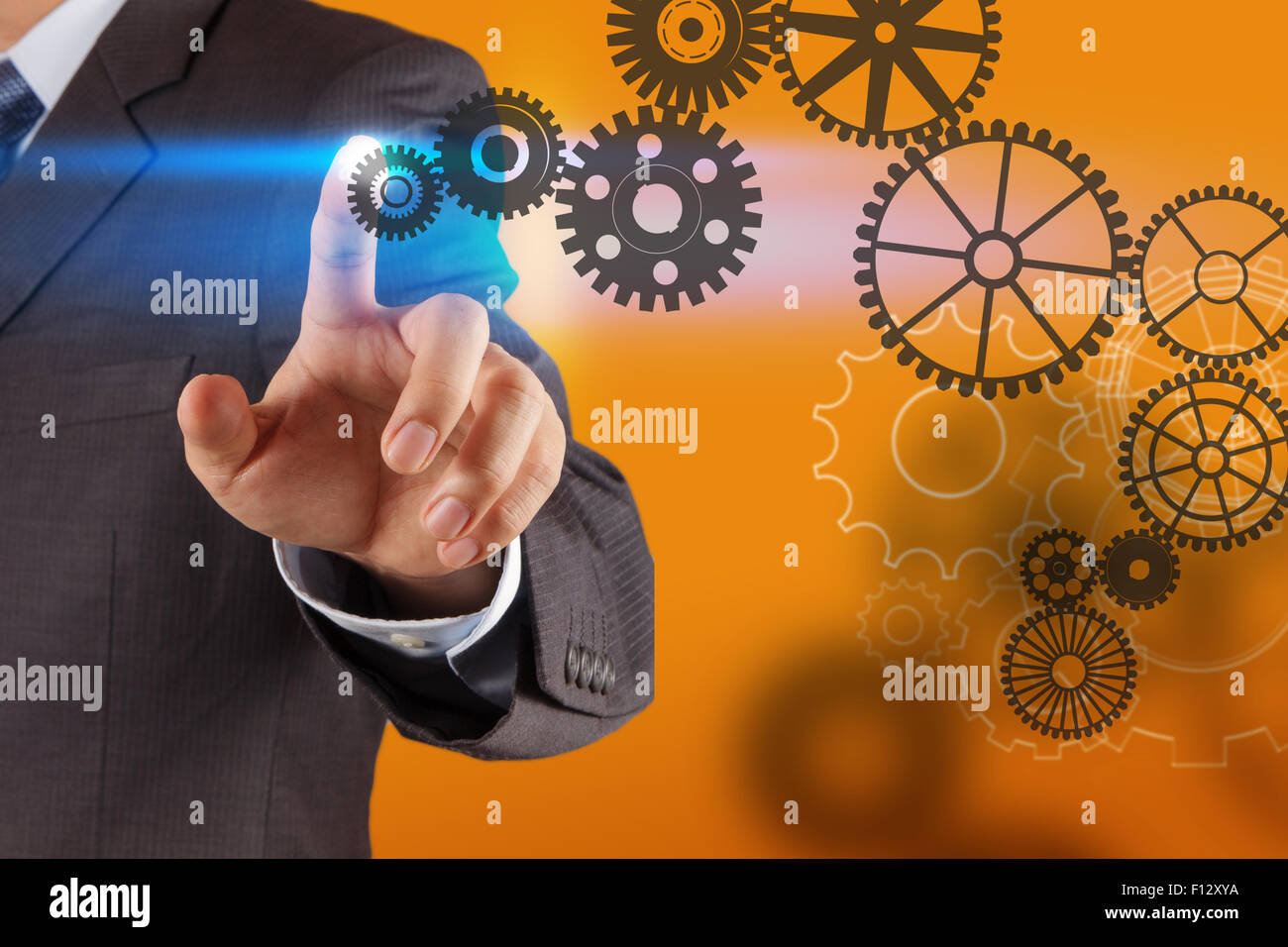 businessman hand draws gear to success concept Stock Photo - Alamy