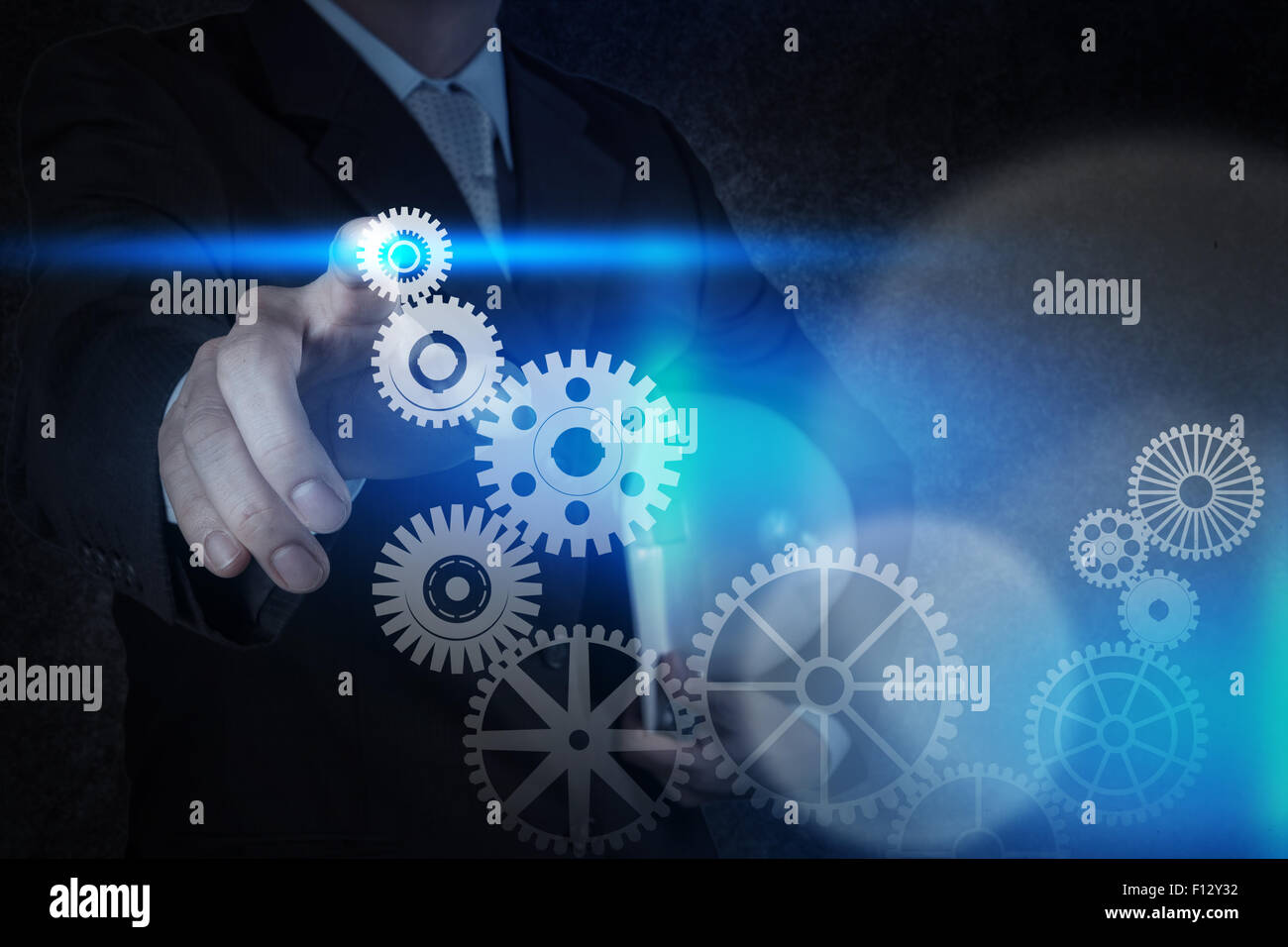 businessman hand draws gear to success concept Stock Photo - Alamy