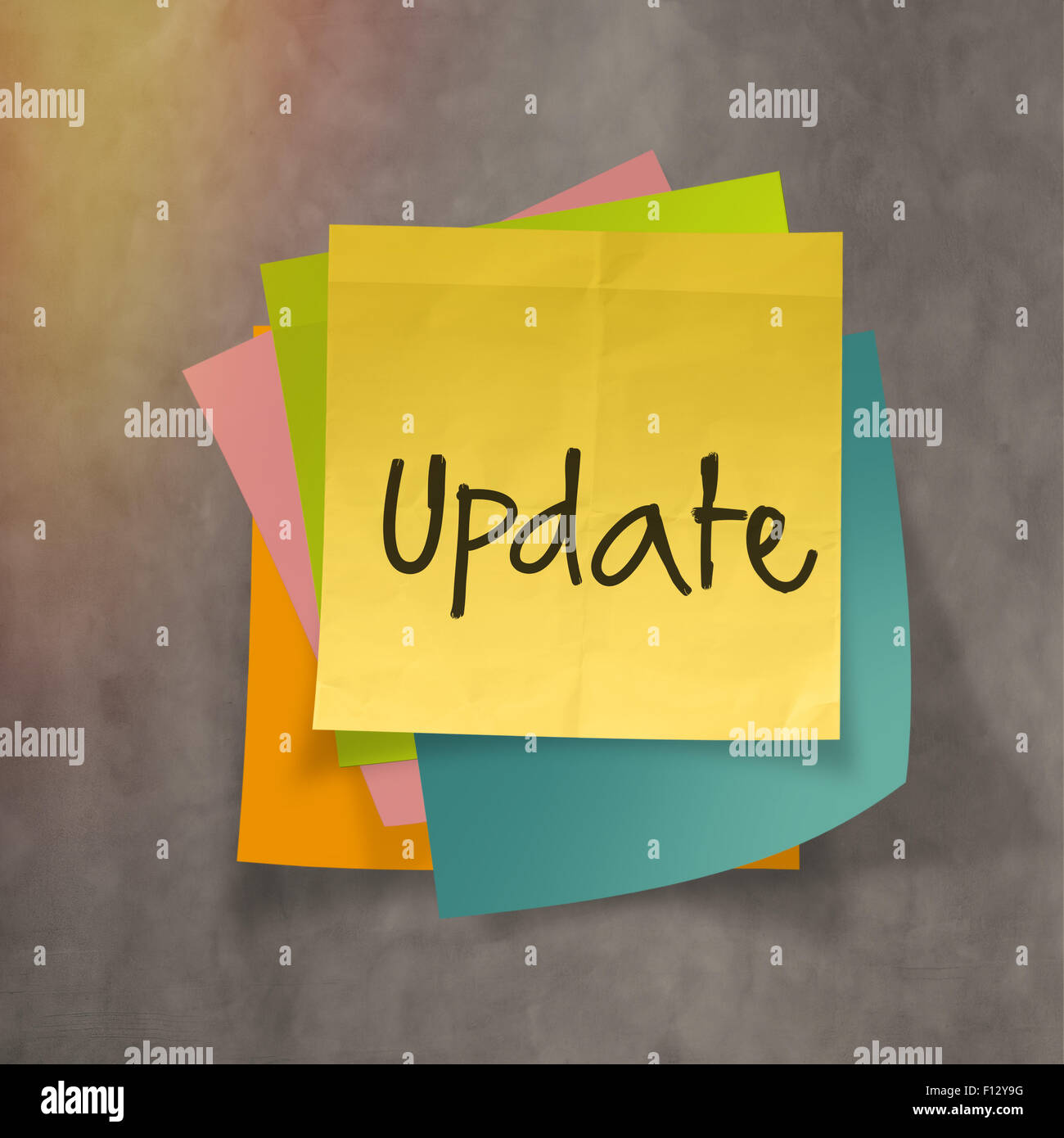update text on sticky note paper on wall texture Stock Photo - Alamy